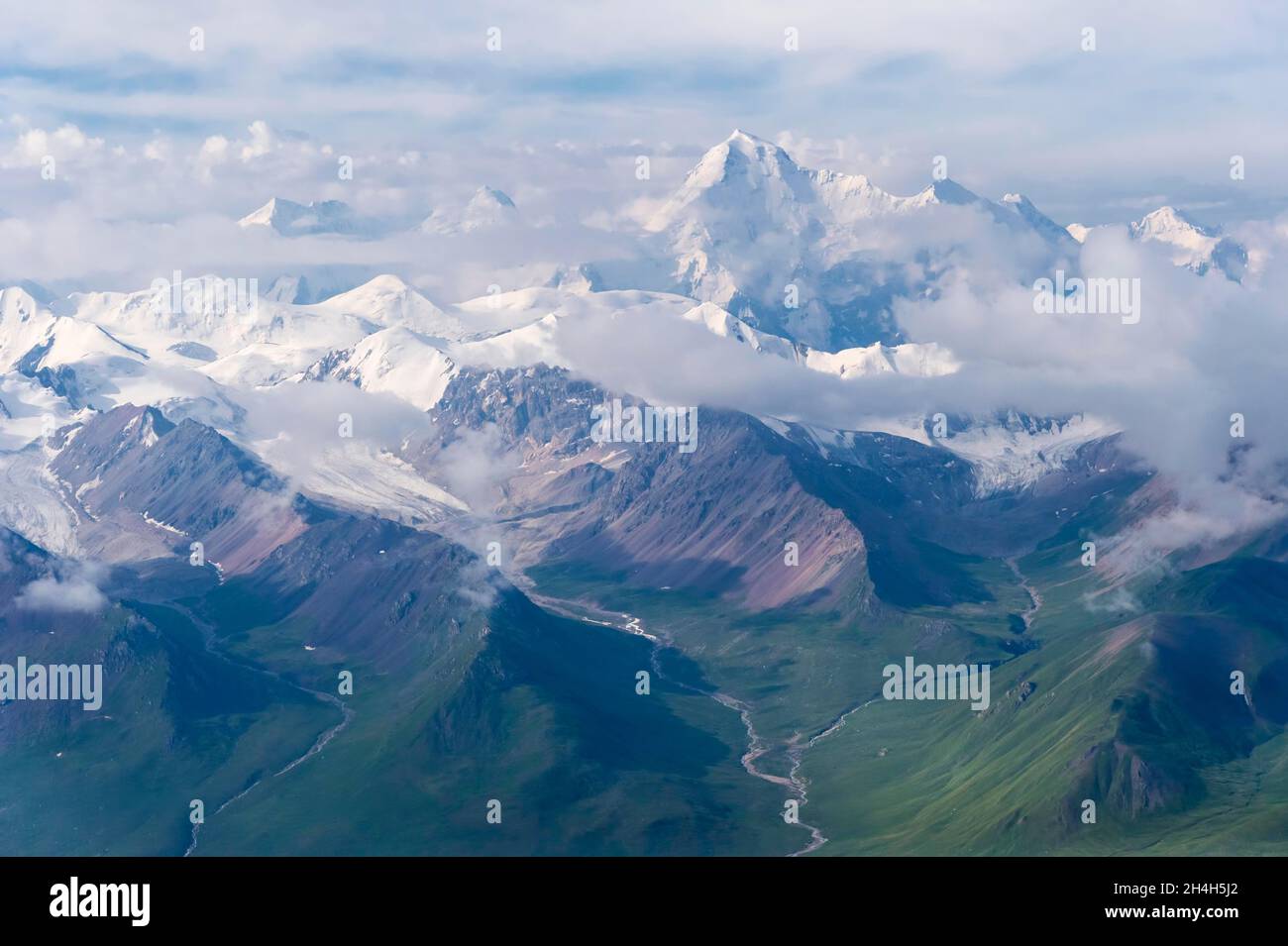Aerial view over the central Tian Shan Mountains, border between ...