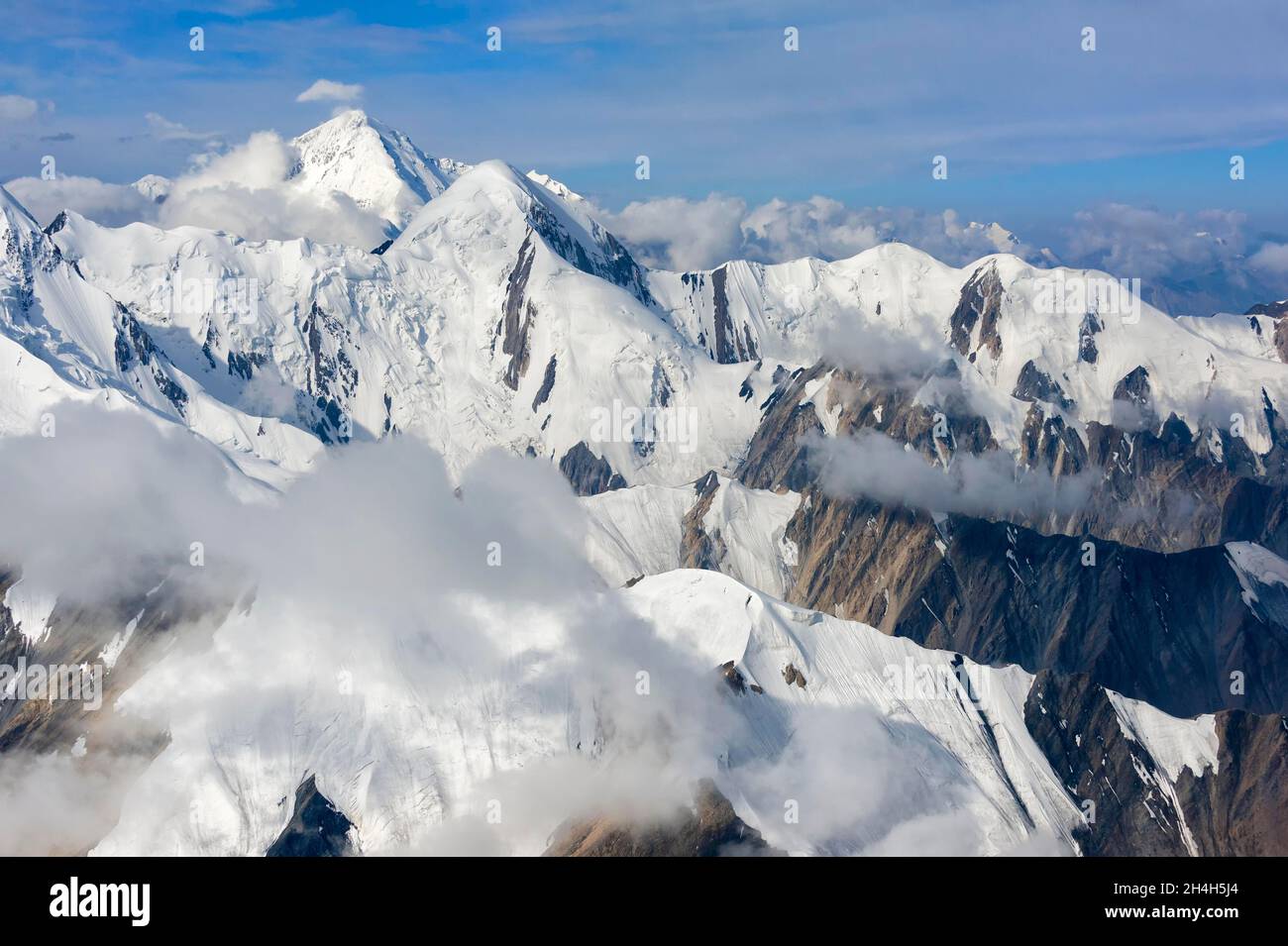 Aerial view over the central Tian Shan Mountains, border between ...