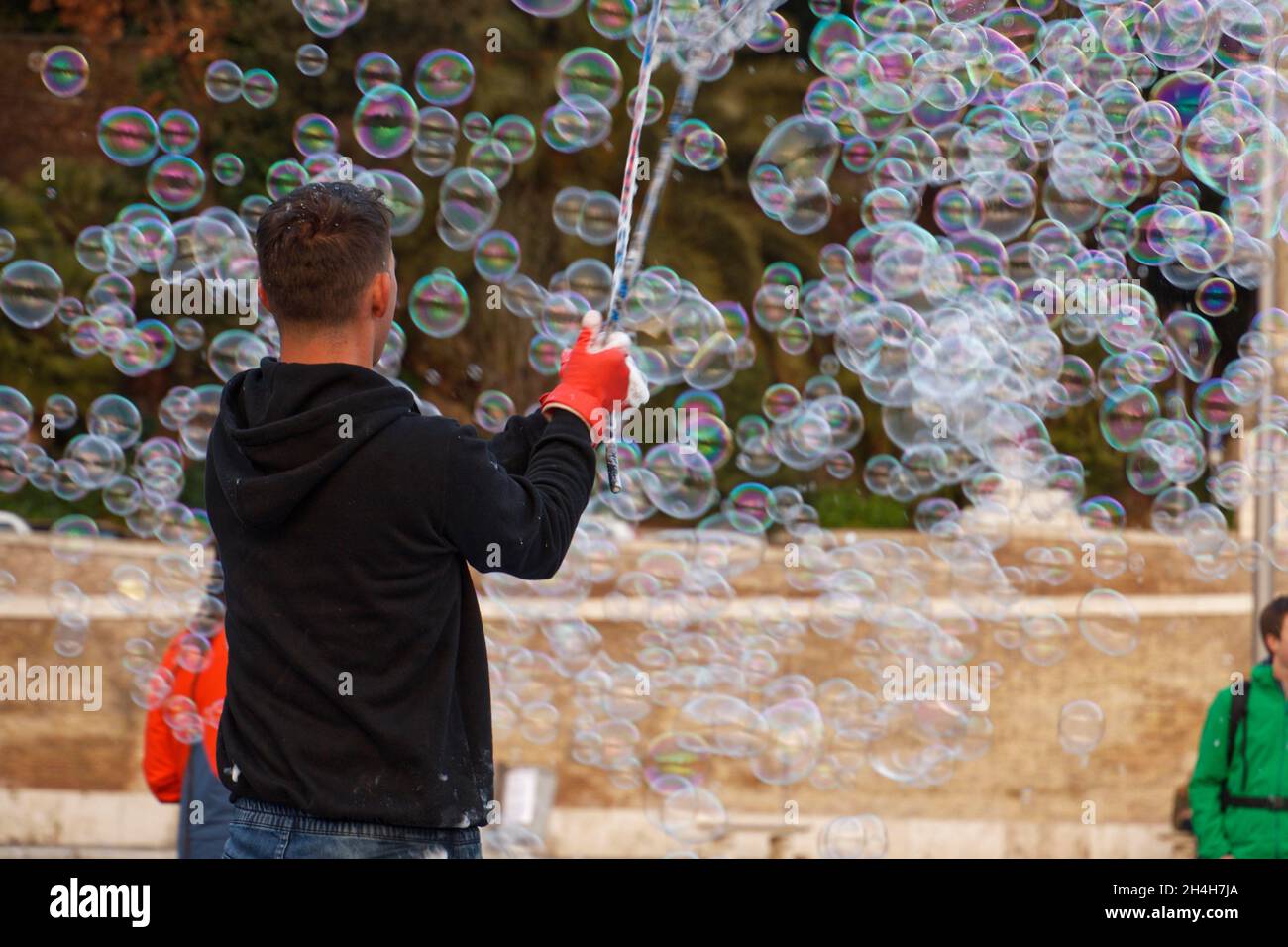 Man blowing soap bubble hi-res stock photography and images - Alamy