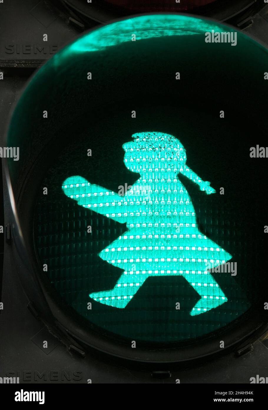 Pedestrian traffic light with green traffic light woman, Reykjavik ...