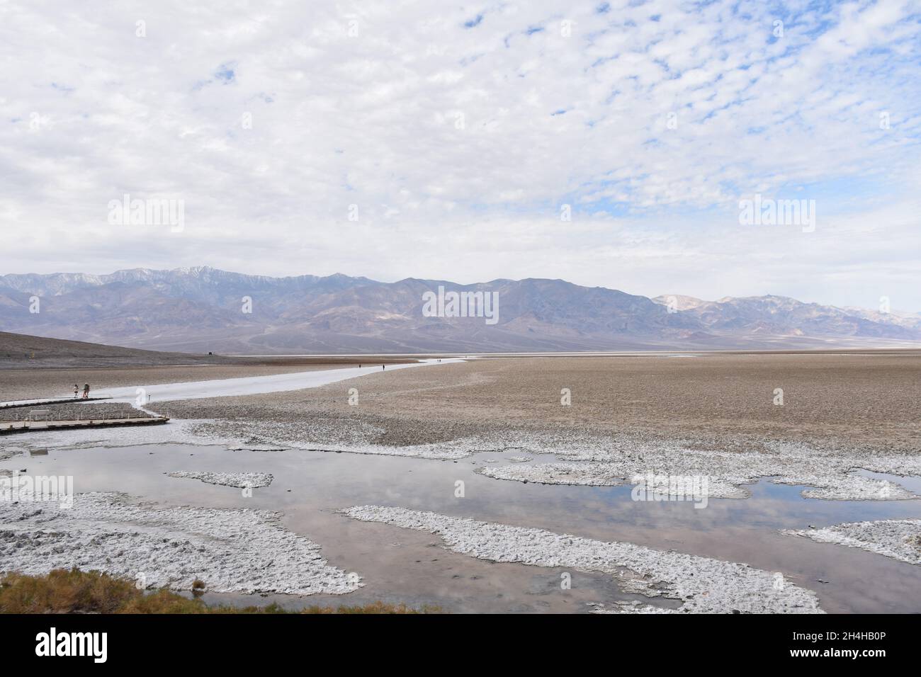 The salt-encrusted Badwater Basin, one of the lowest points on earth at ...
