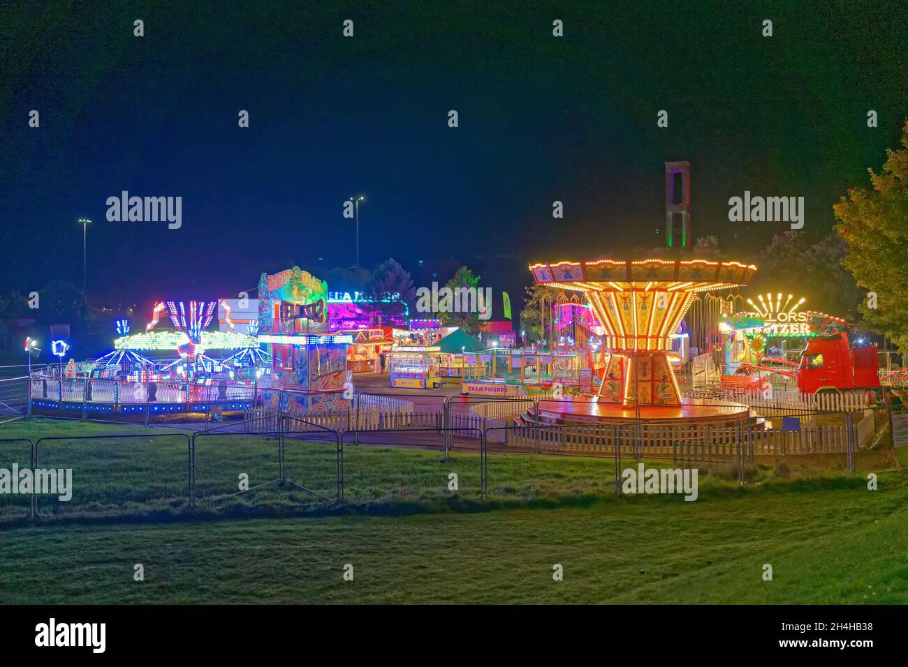 Night fun fair lit up bright lights clydebank town centre Stock Photo ...