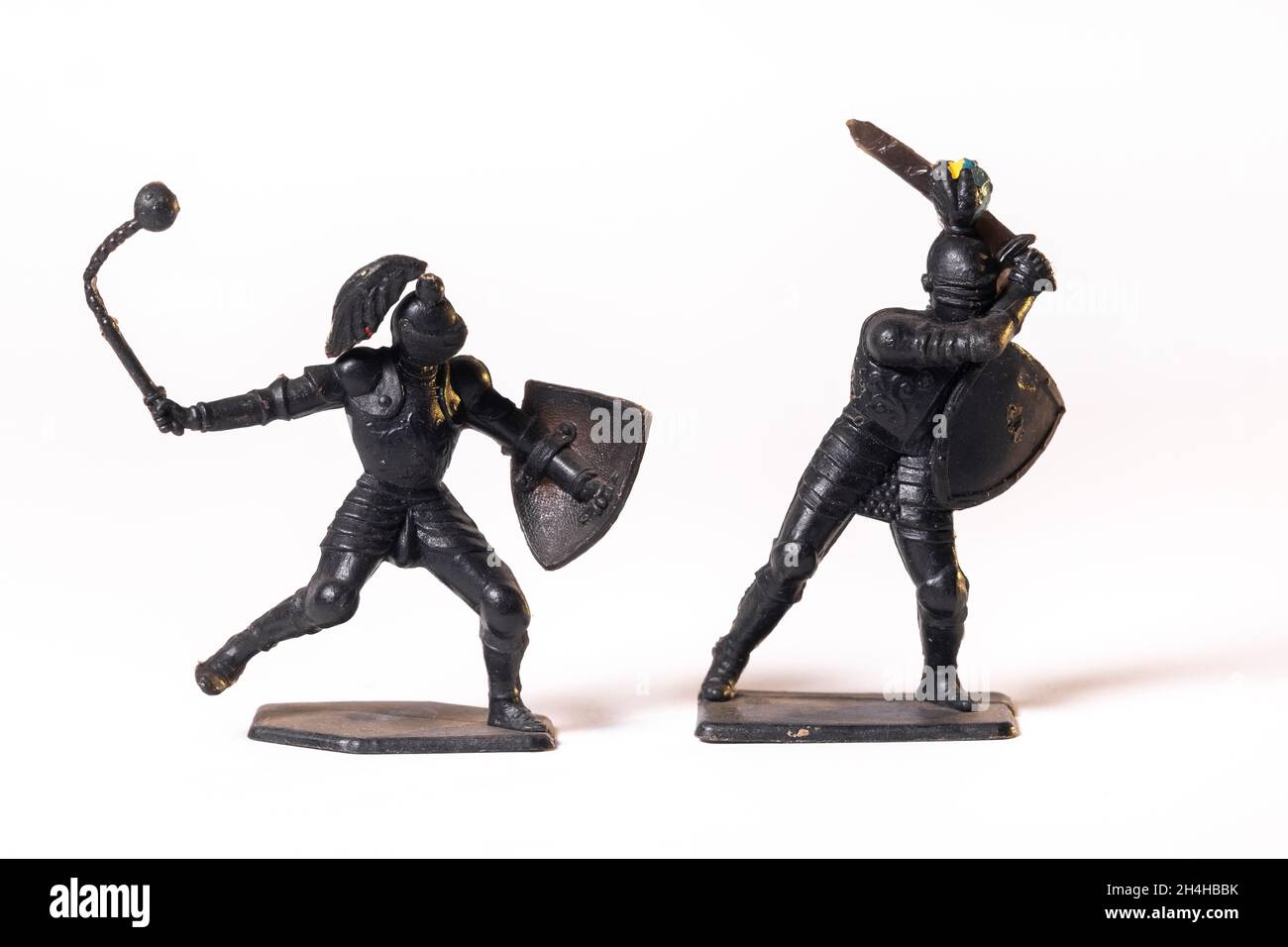 Vintage toys black knights isolated on white background Stock Photo - Alamy