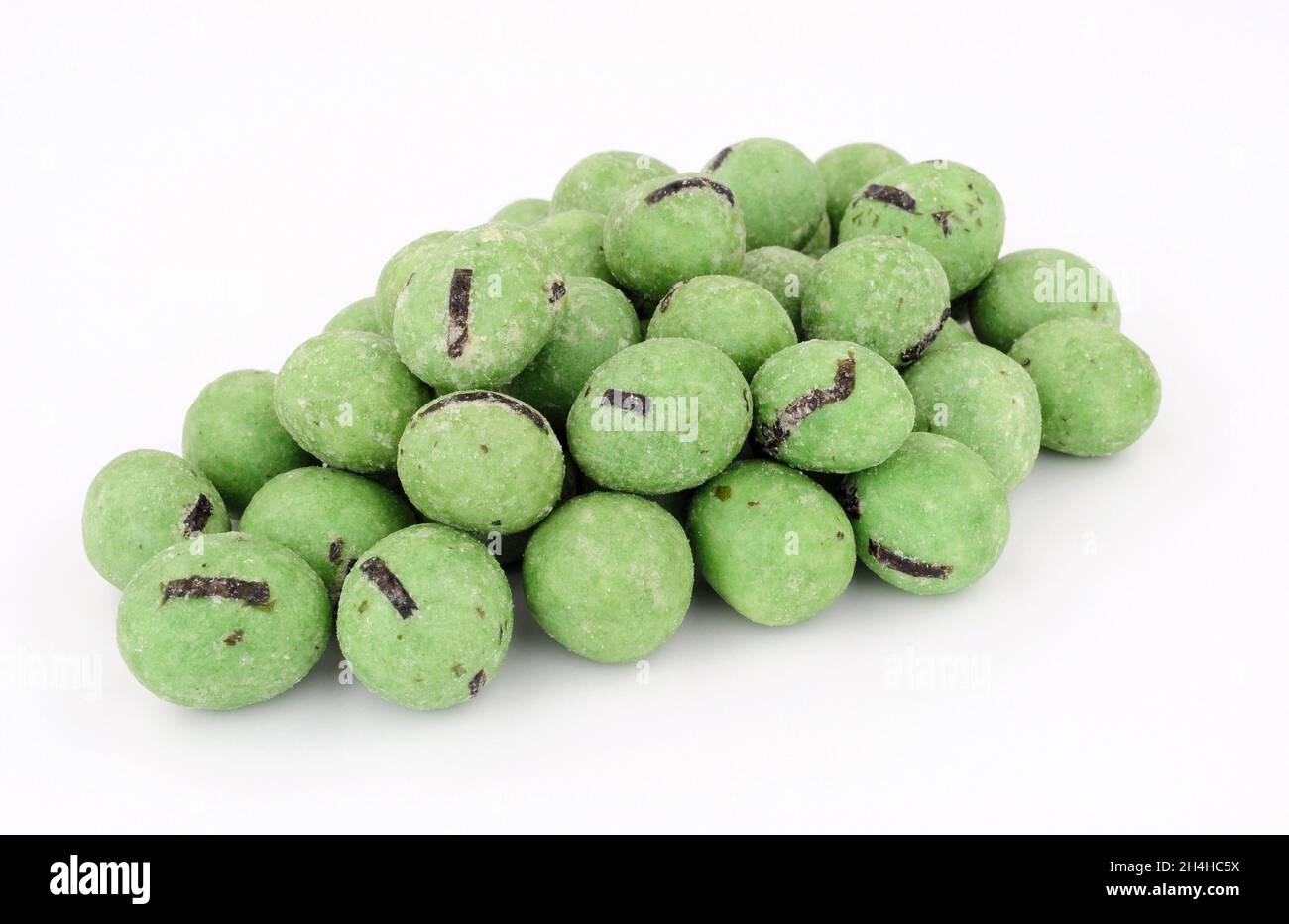 Group of wasabi coated roasted peanuts with a strong hot mustard ...