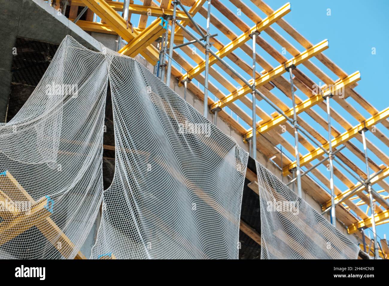 Protective building network used on building Stock Photo - Alamy