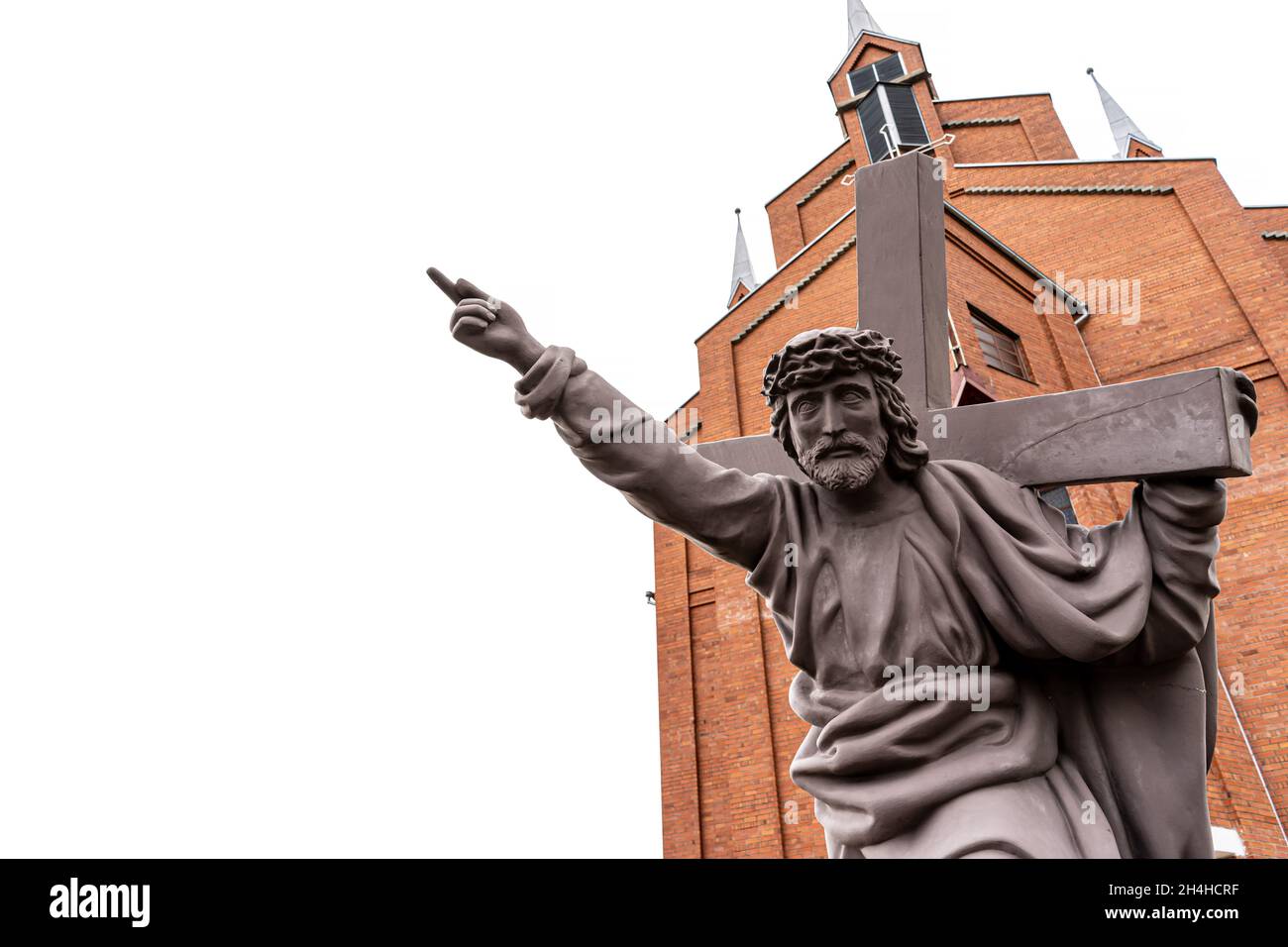 Jesus Christ points the direction with his hand on a white background ...