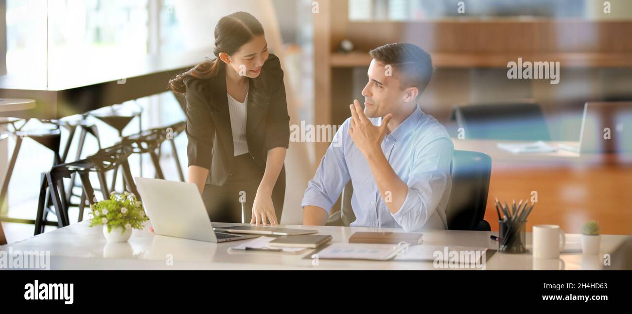 Colleague Giving Advice High Resolution Stock Photography and Images ...