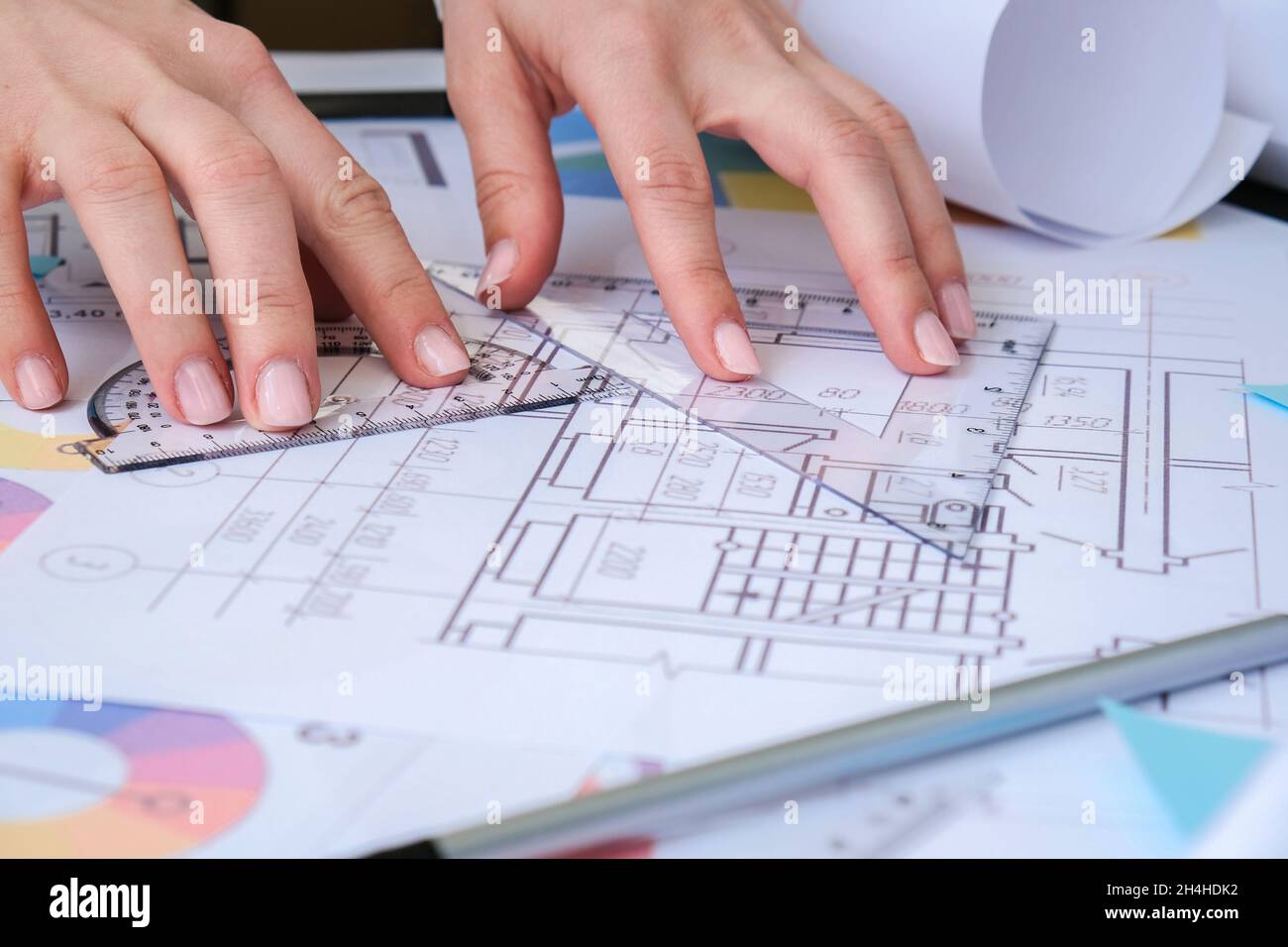 Hands use pencil with a protractor. Architectural Project drawings with ...
