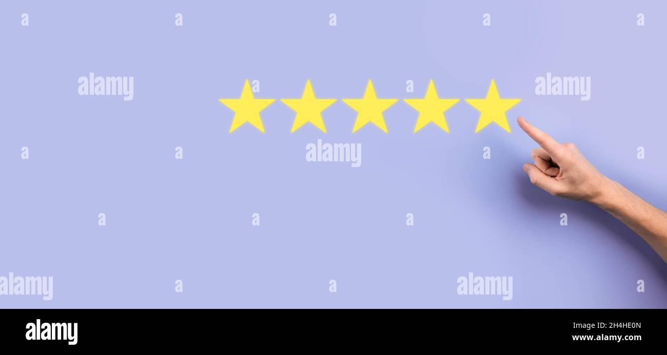 Man holds smart phone in hands and gives positive rating, icon five ...