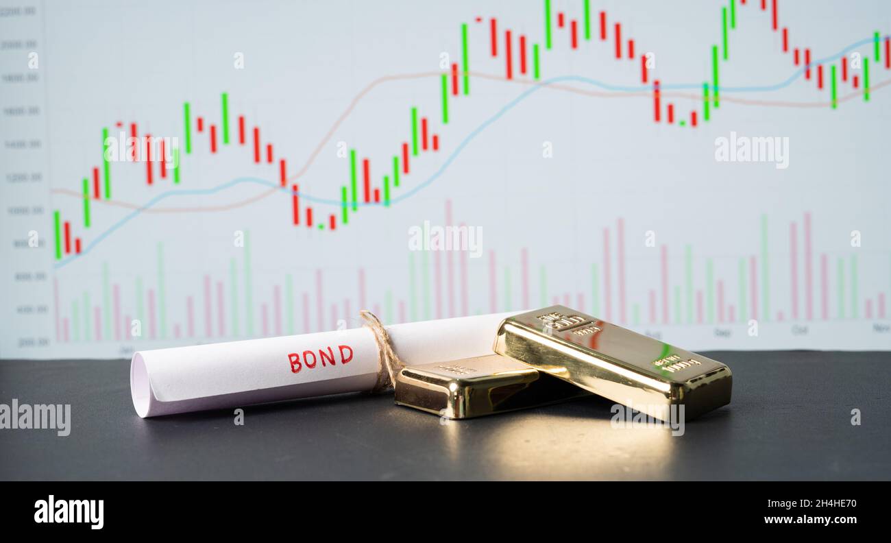 Concept of gold bond showing with Gold bars and Bond paper with Stock ...