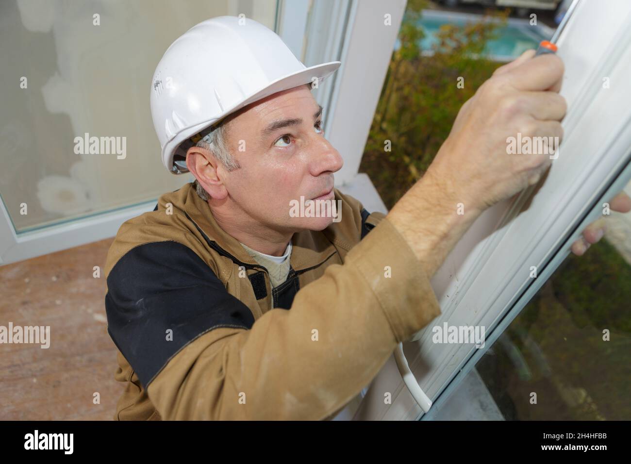 installation of plastic windows Stock Photo - Alamy