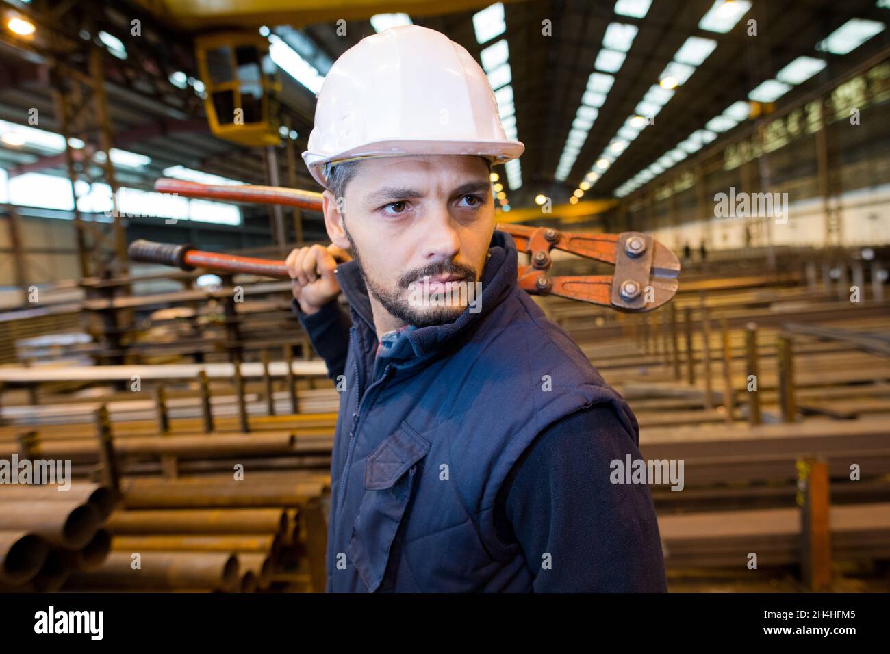 worker with tools in factory Stock Photo - Alamy