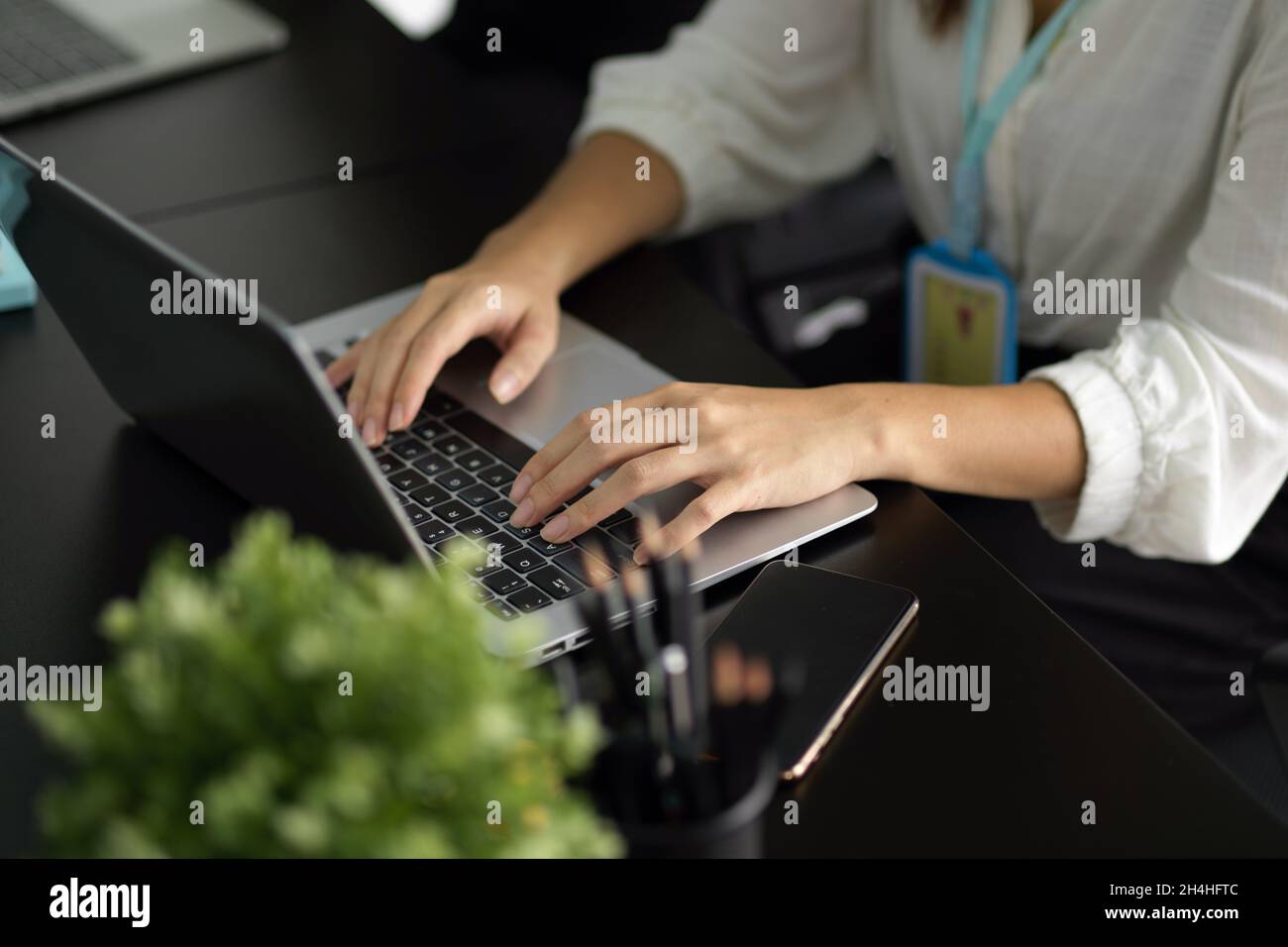 Employee typing hi-res stock photography and images - Alamy