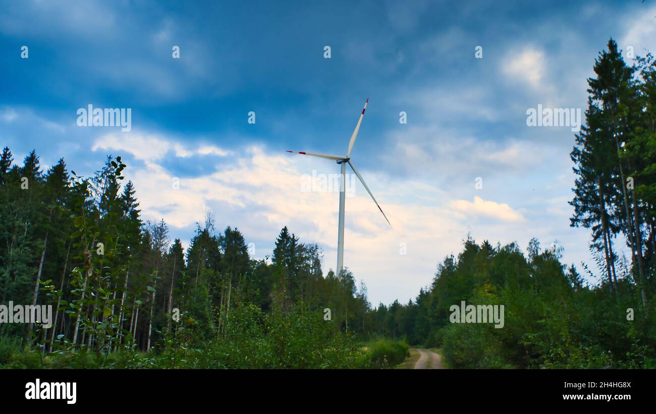 Wind turbine in a forest Stock Photo - Alamy
