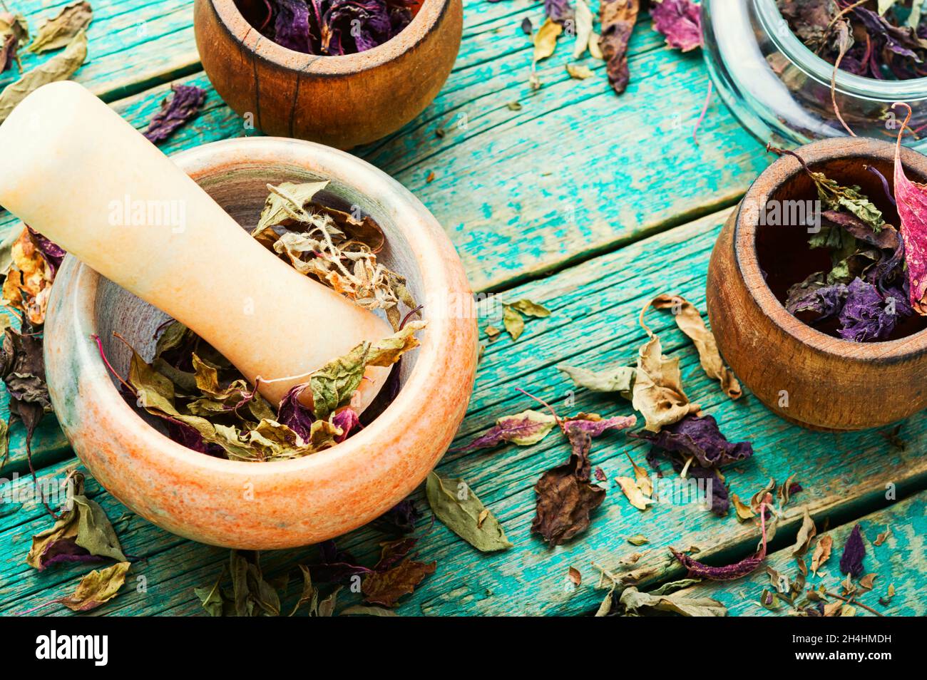 Dried natural basil spice on old rustic wooden background.Dry basil ...