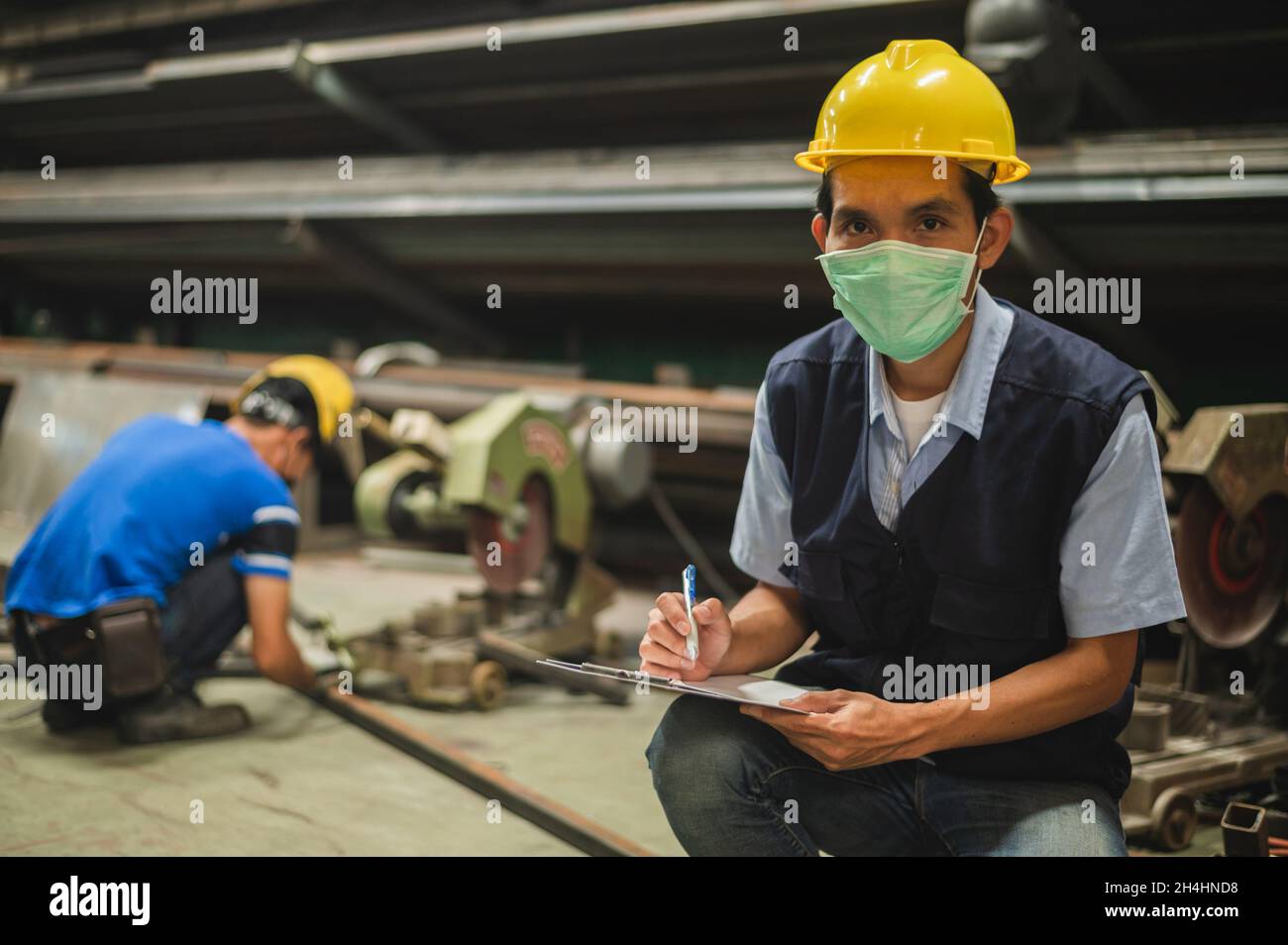 Safety officers are inspecting work safety of industrial workers Stock ...