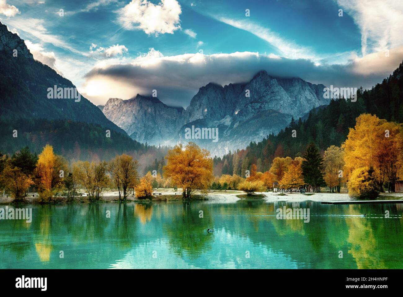 Triglav mountain peak at sunrise Stock Photo - Alamy