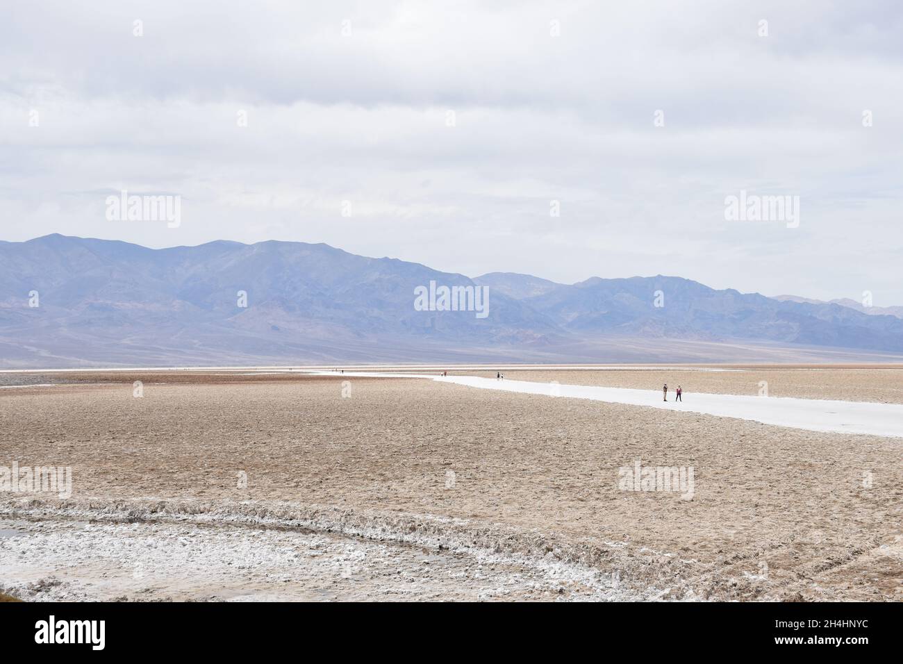 The salt-encrusted Badwater Basin, one of the lowest points on earth at ...