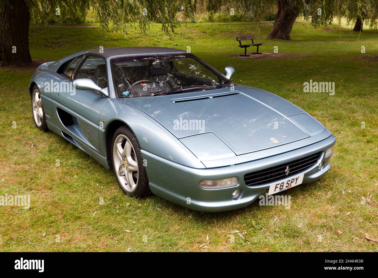 Three-quarters front view of a Blue, 1996, Ferrari 355 GTS, on display ...