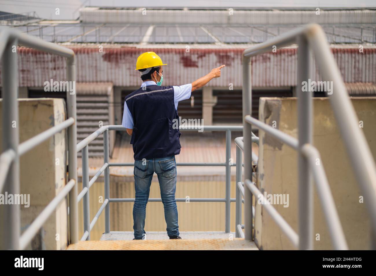 Engineers write industrial factory inspection reports Stock Photo - Alamy