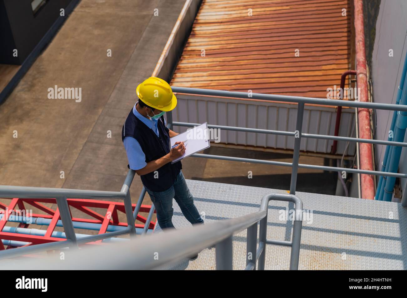Engineers take note of industrial plant inspections Stock Photo - Alamy
