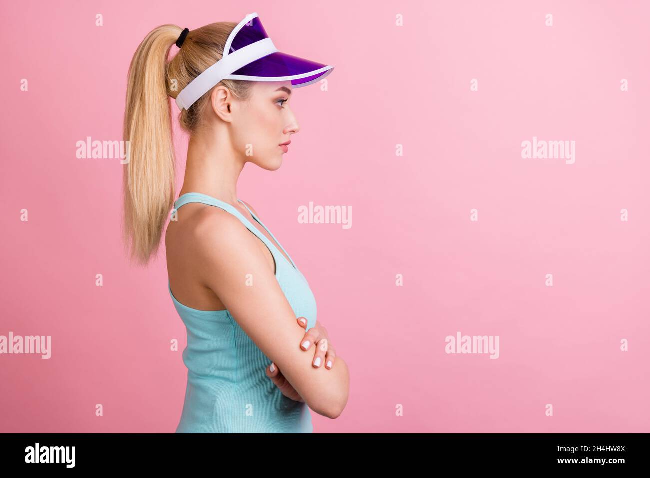 Profile photo of serious tail hairdo millennial sporty lady crossed ...