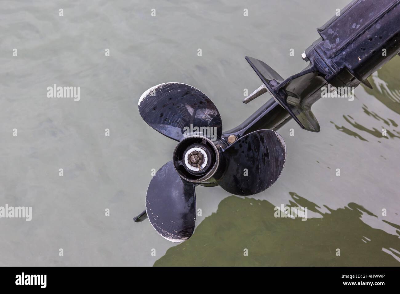 Top view of a boat engine with a propeller over water during the ...