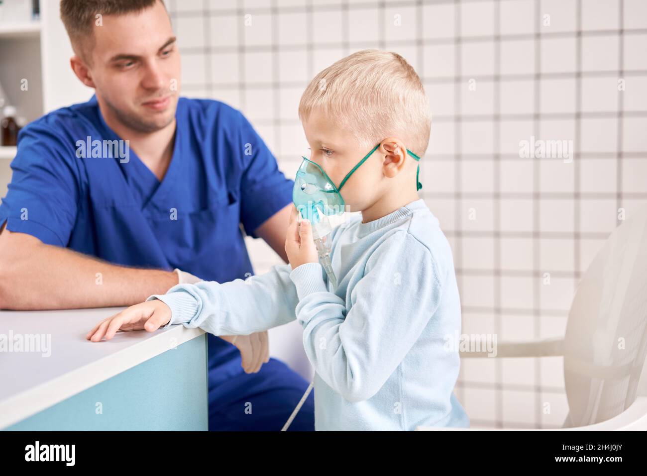 A pediatrician diagnoses lung disease and provides treatment. Breathe ...