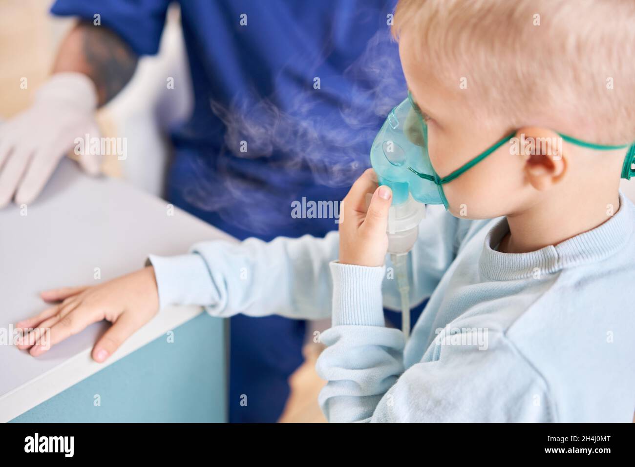 A pediatrician diagnoses lung disease and provides treatment. Breathe ...