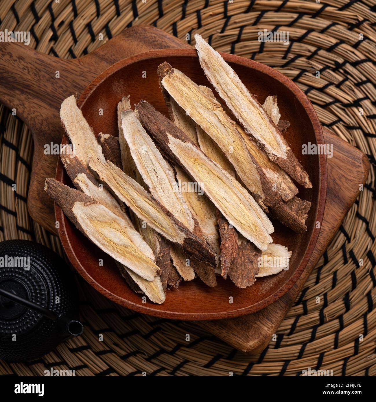 Top view of Chinese traditional herbal medicine Astragalus root on ...