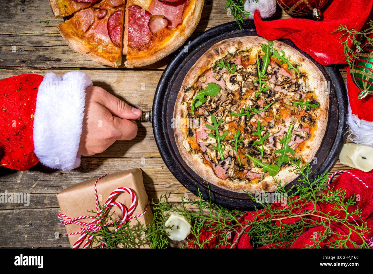 Santa eating pizza hi-res stock photography and images - Alamy