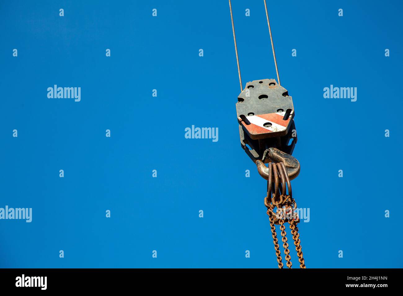 Crane load block with hook and cables hi-res stock photography and ...