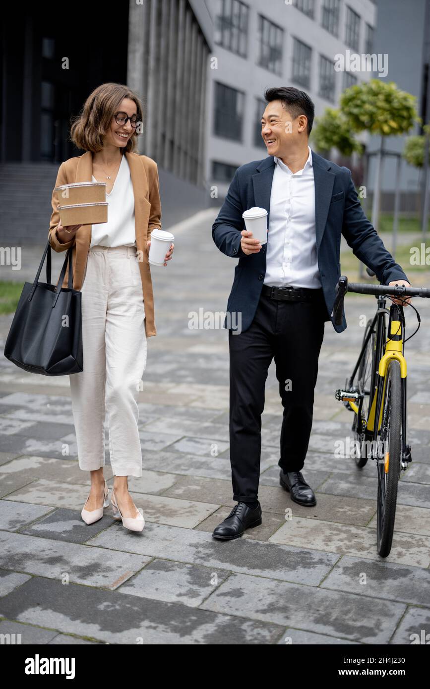 Coffee break walk office smile hi-res stock photography and images - Alamy