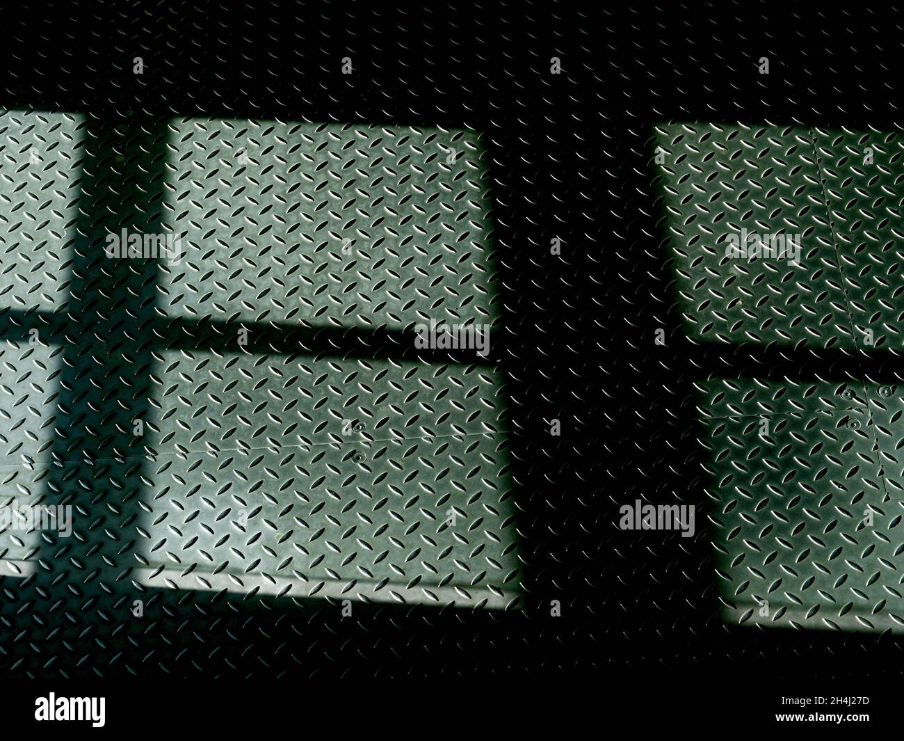 Studded metal walkway pattern with window frame pattern in monochrome ...