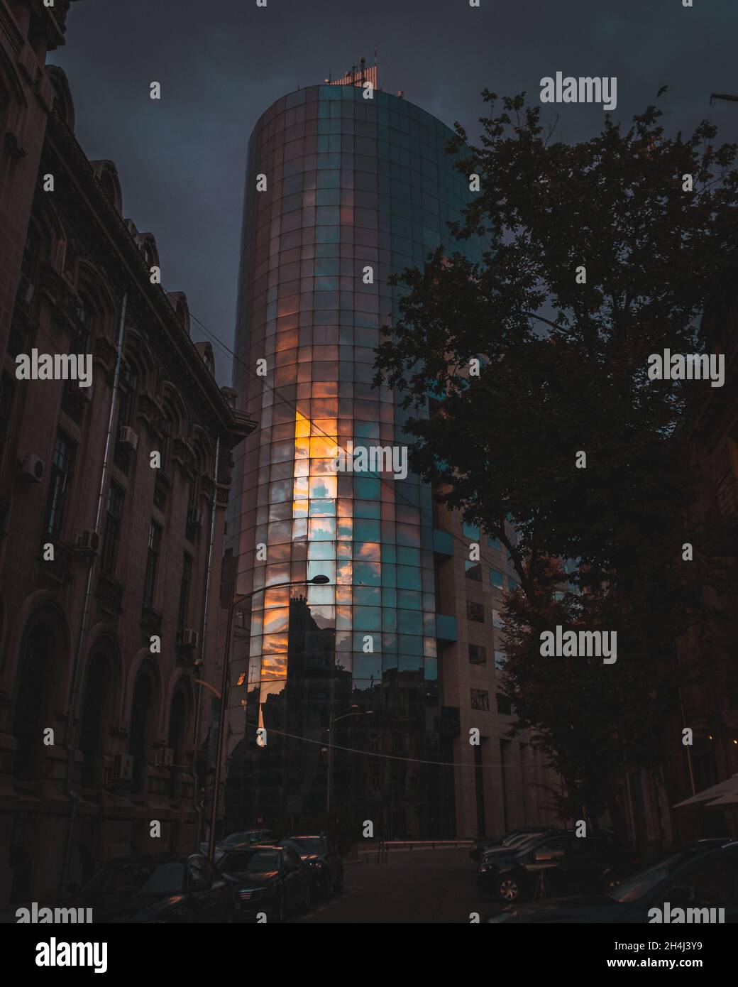 BUCHAREST, ROMANIA - Sep 01, 2021: The reflection of the sunset in the ...