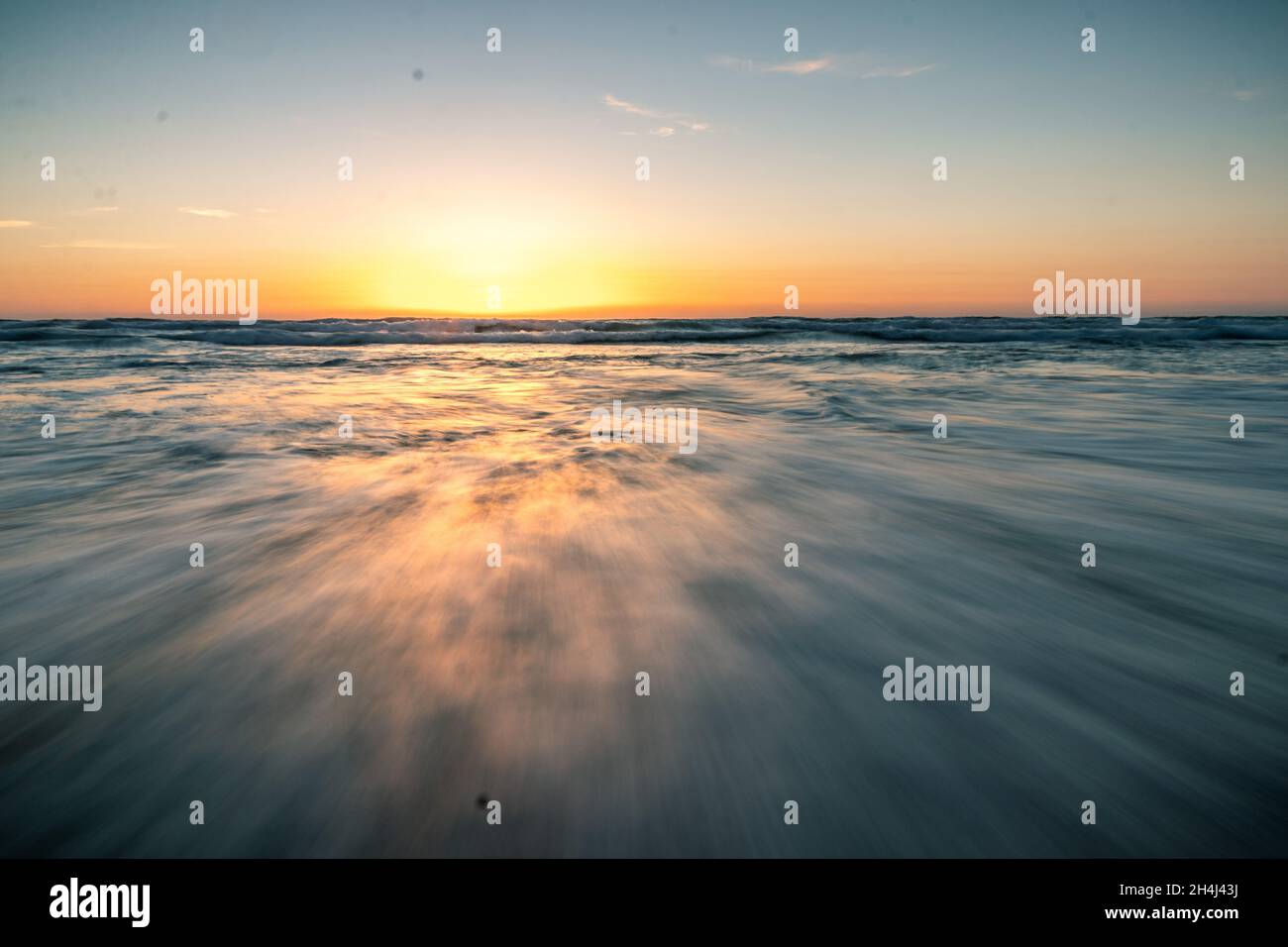 Low angle wide view of the sunset at the sea Poleg beach Israel Stock ...