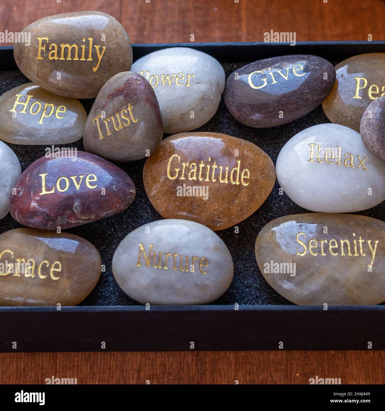Motivational inspirational stones with writings. Serenity, gratitude ...