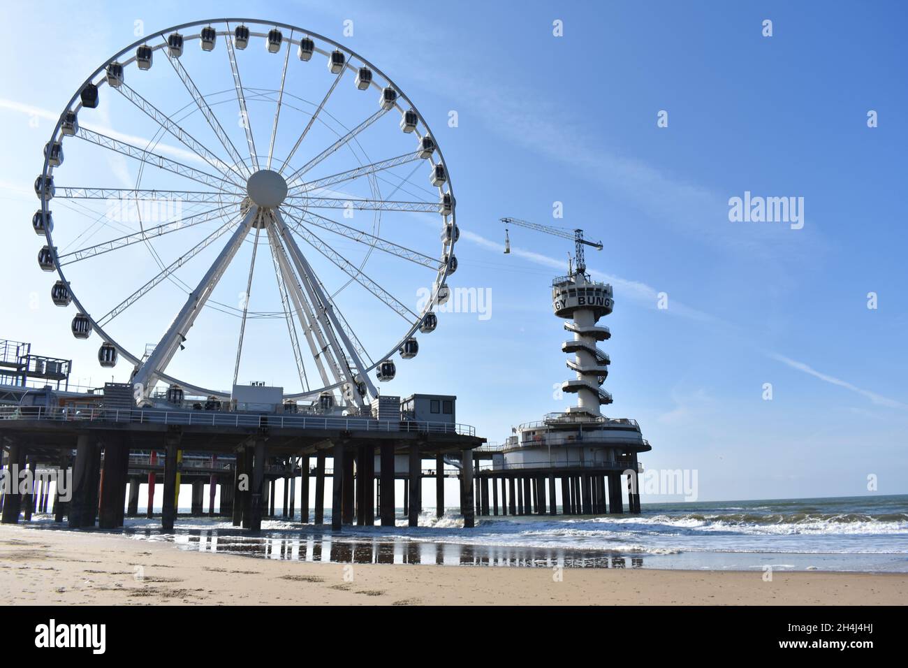 THE HAGUE, NETHERLANDS - Jul 31, 2019: A landscape of a pier with ...
