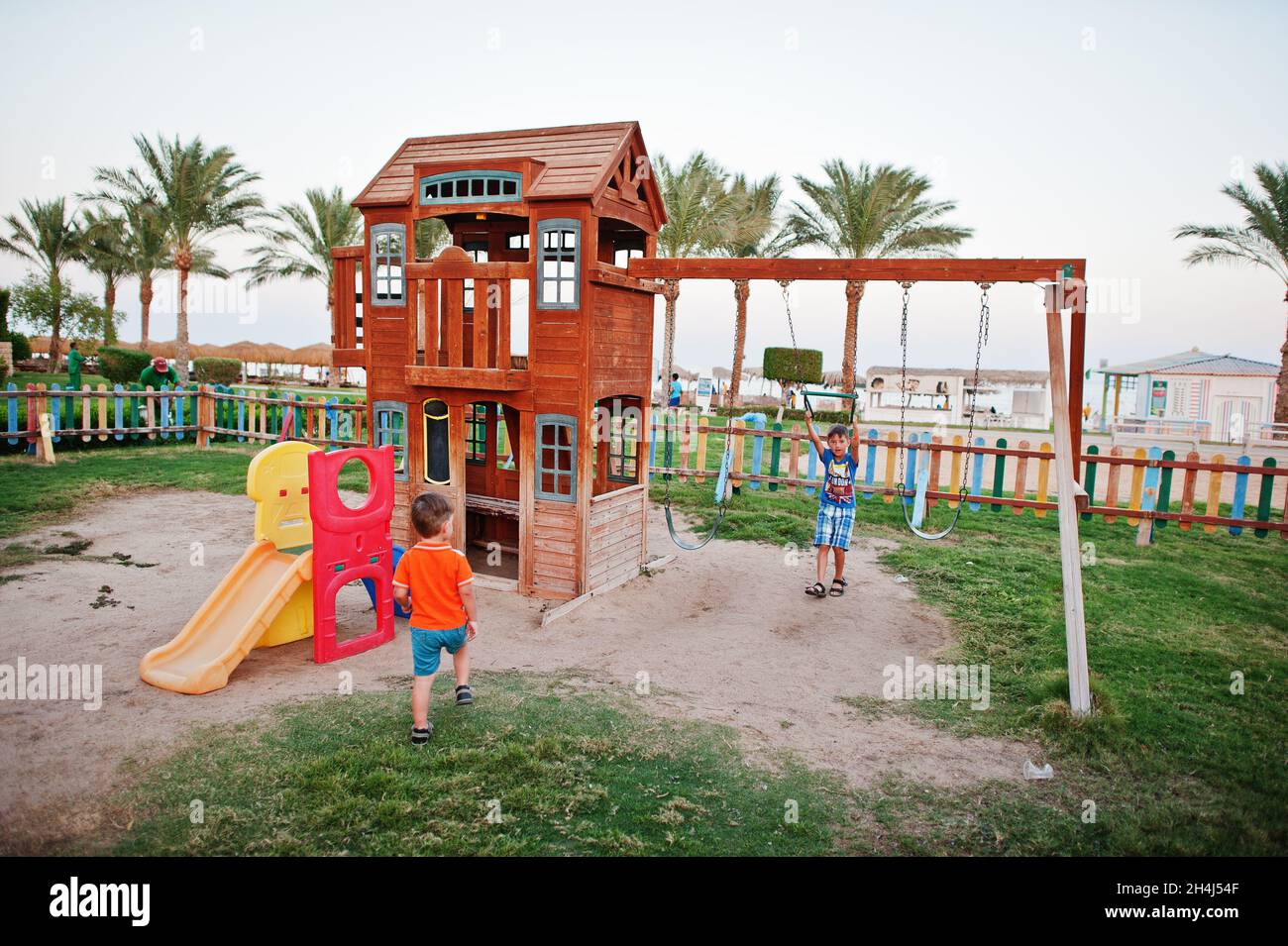 Two brothers at playground of egyptian resort Stock Photo - Alamy