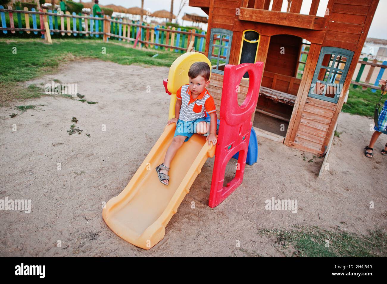 Boy at playground of egyptian resort Stock Photo - Alamy