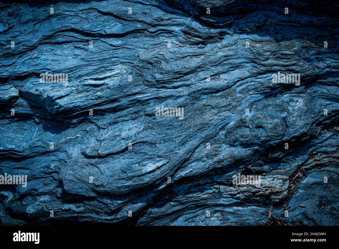 Natural stone or rock background ,granite metamorphic rock weathered on ...