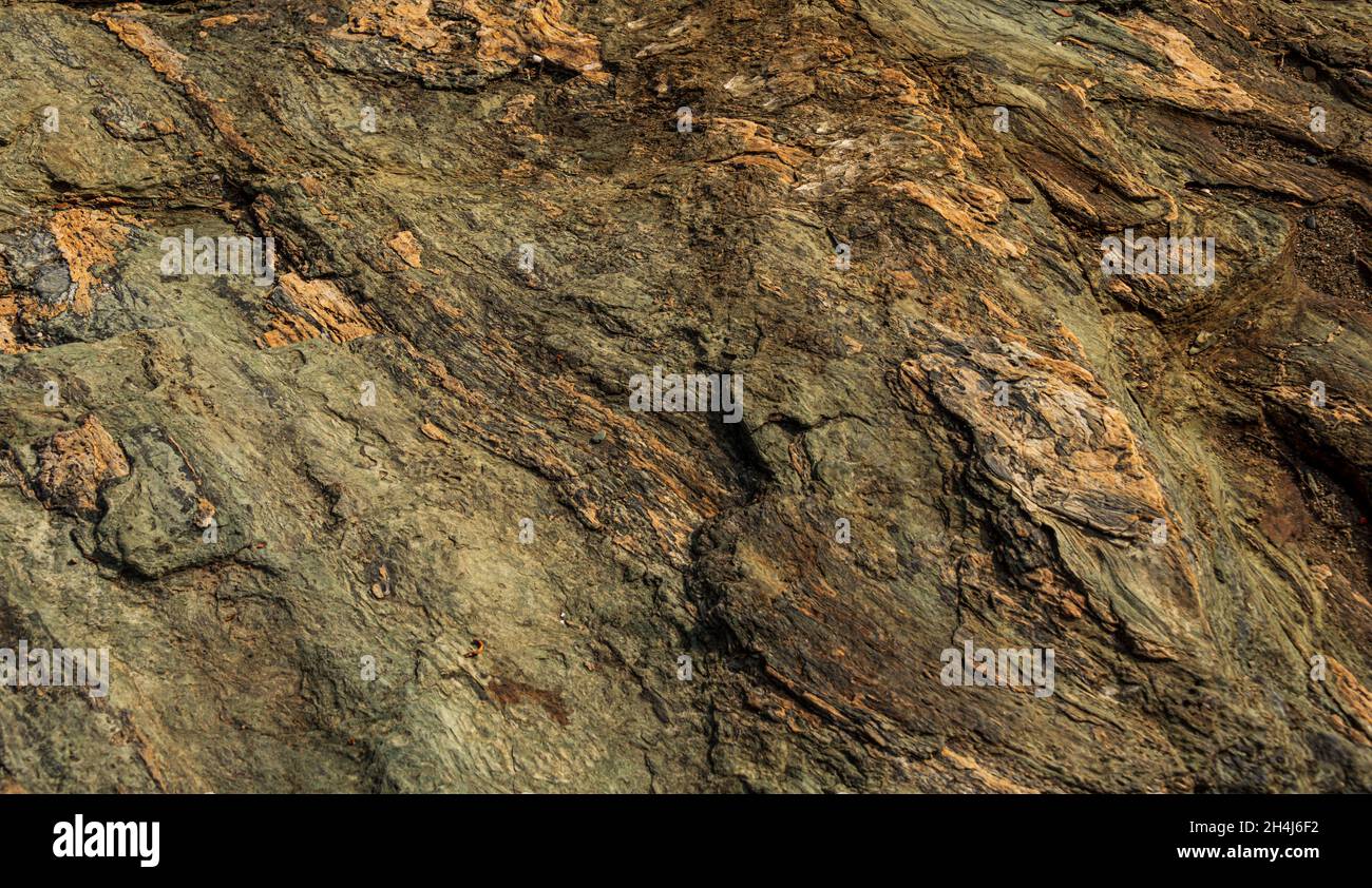 Natural stone or rock background ,granite metamorphic rock weathered on ...