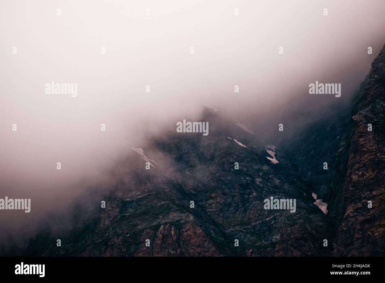 Landscape of alps in Gran Paradiso National Reservation under a cloudy ...