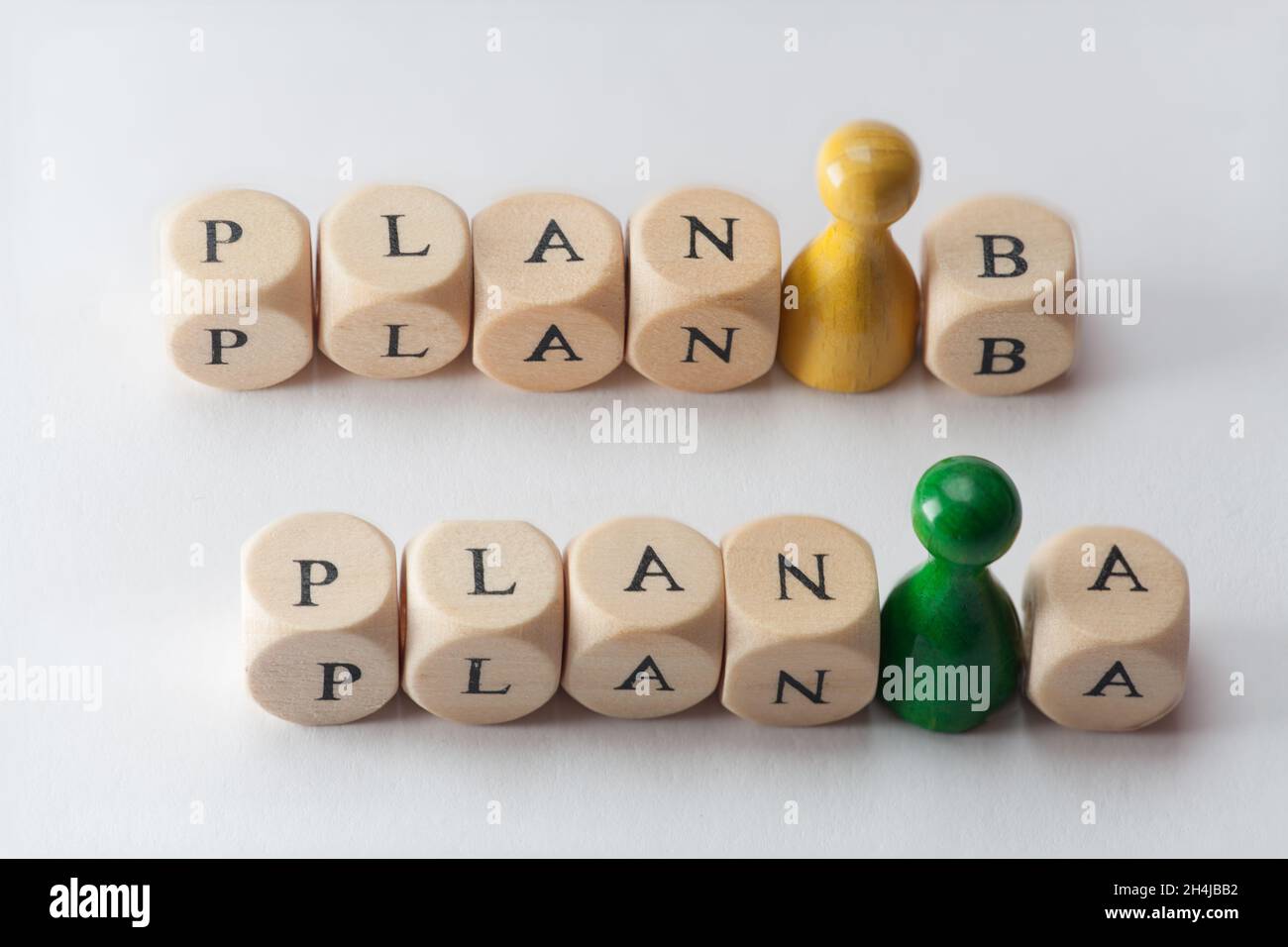 The words Plan A and Plan B are made with wooden letters, each with a ...