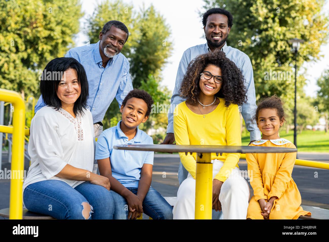 Beautiful happy african american family bonding at the park - Black ...