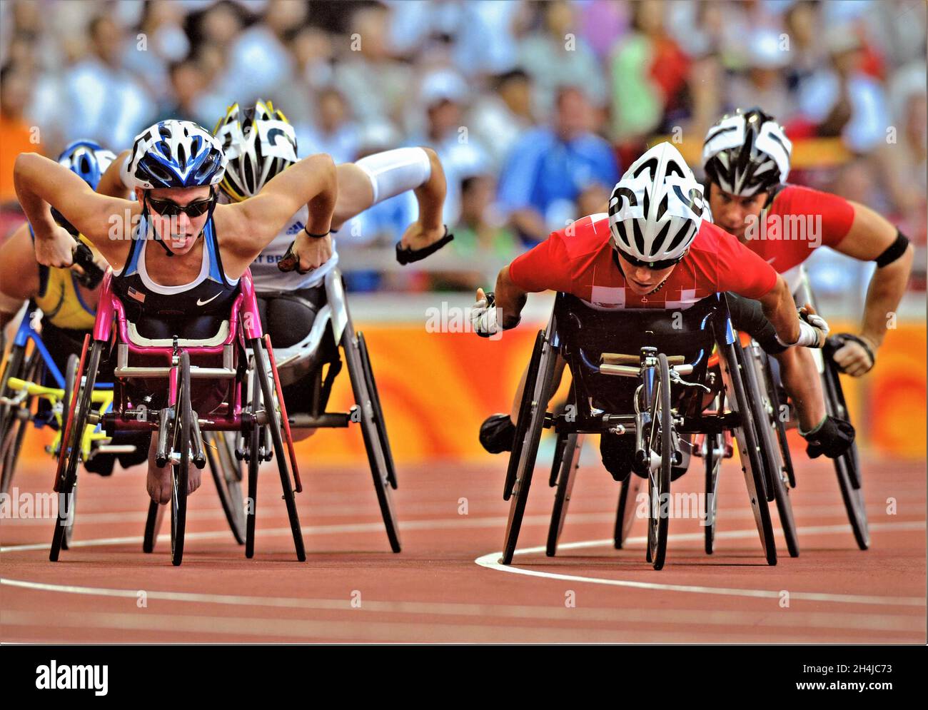 Racers in wheelchairs during the final corner of Olympic trials Stock ...