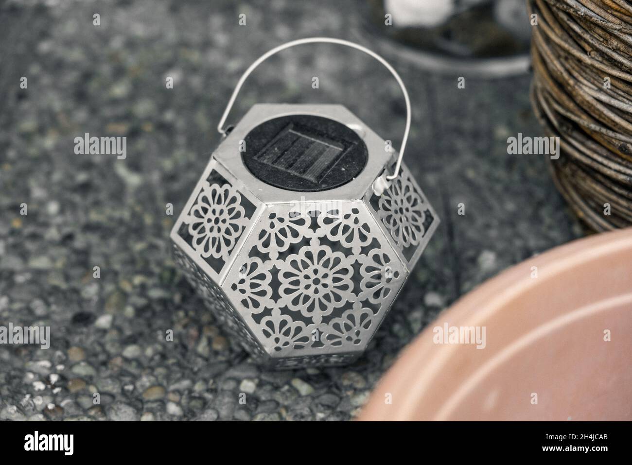 Small solar-powered light on the ground Stock Photo - Alamy