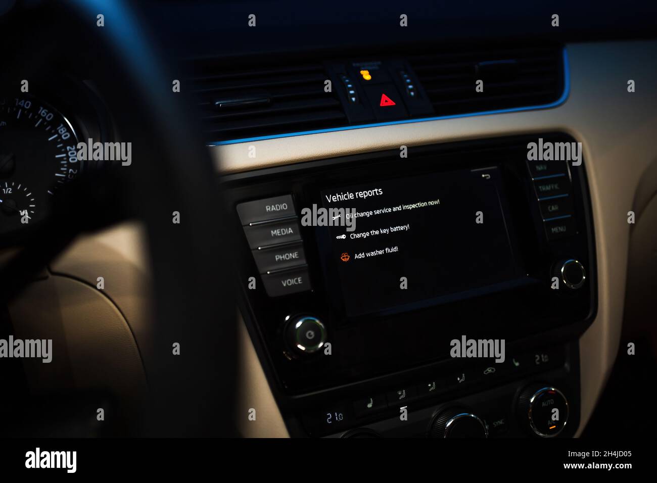 Modern new car with Vehicle reports on the dashboard Stock Photo - Alamy