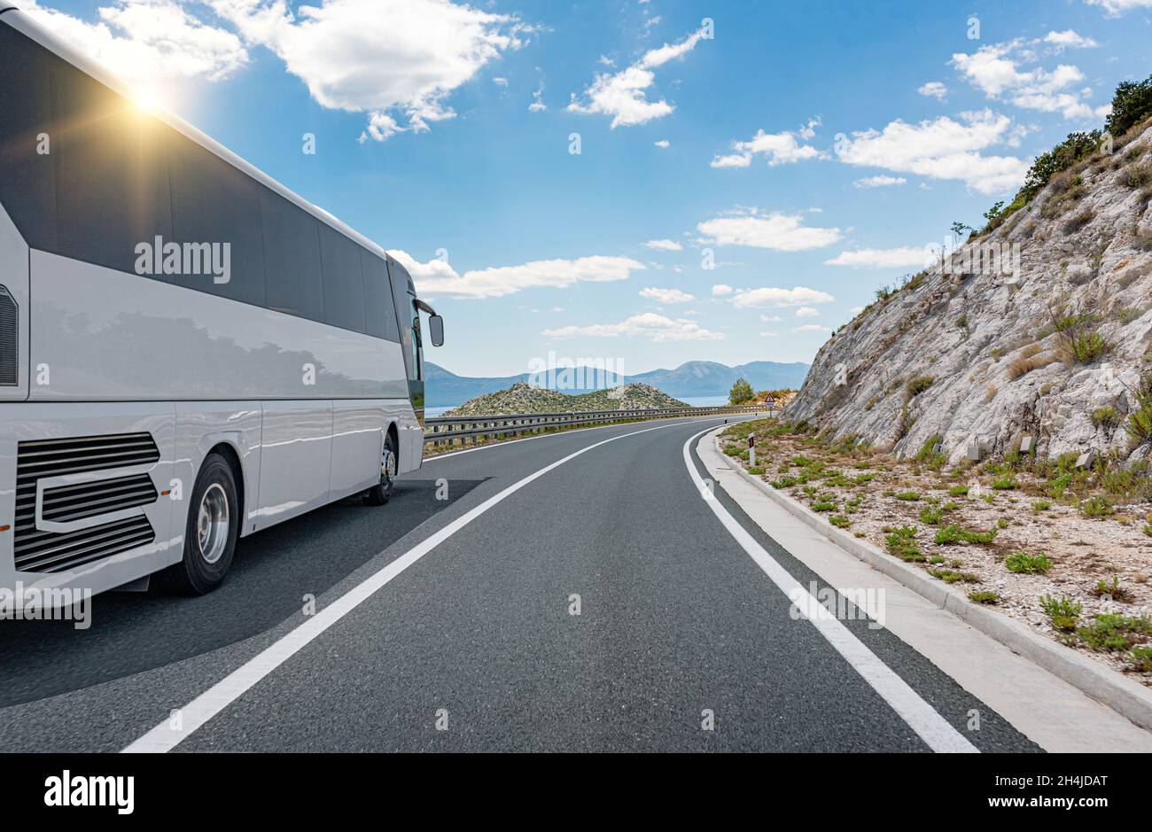 Passenger bus on the highway against the backdrop of a beautiful ...