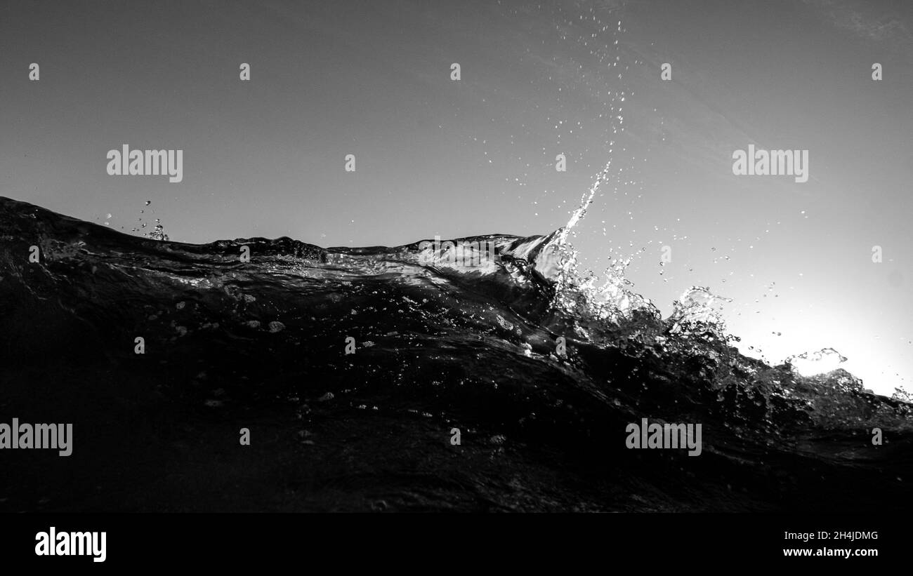Grayscale shot of the ocean wave. Beautiful background Stock Photo - Alamy